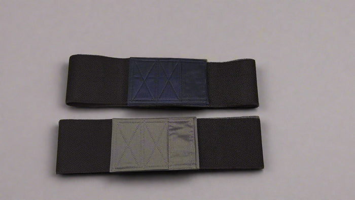 Wide elastic strap for keeping legs together for wheelchair users